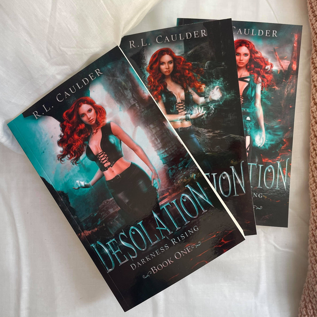 Darkness Rising Trilogy by R.L. Caulder – Fiction & Friction